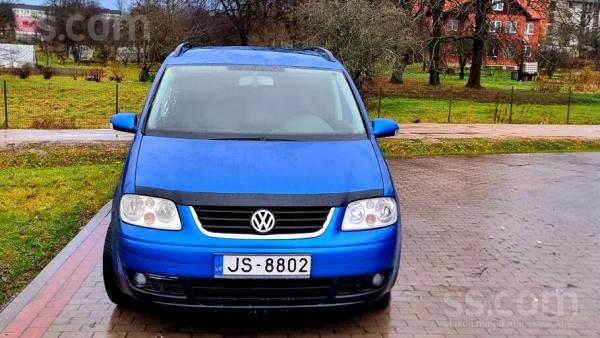 Zils Volkswagen Touran 2004 Cēsis, ar dzinēja tilpumu 1.90 L un nobraukumu 430 tūkst. km par 2200 €, foto 2 vietnē AUTOMOTO.COM.LV