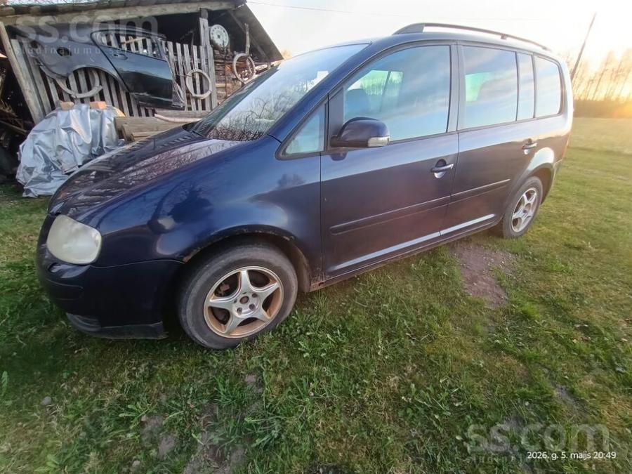 Zils Volkswagen Touran 2004 Limbaži, ar dzinēja tilpumu 2.00 L un nobraukumu 444 tūkst. km par 650 €, foto 6 vietnē AUTOMOTO.COM.LV