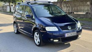 Blue Volkswagen Touran 2004 in Telschi, with an engine capacity of 1.97 L and mileage of 249 thousand km for 1950 €, photo  on AUTOMOTO.COM.LV