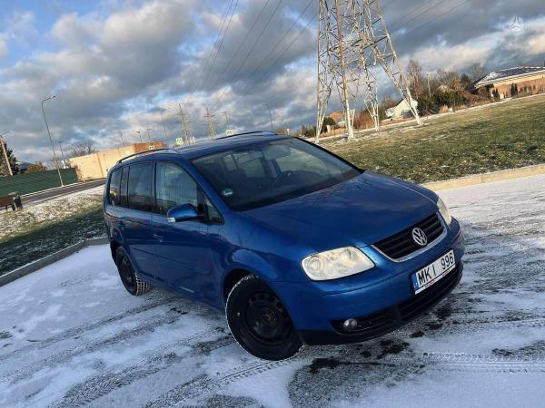 Zils Volkswagen Touran 2005 Kauņa, ar dzinēja tilpumu 1.97 L un nobraukumu 392 tūkst. km par 1550 €, foto 2 vietnē AUTOMOTO.COM.LV