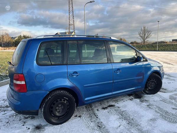 Zils Volkswagen Touran 2005 Kauņa, ar dzinēja tilpumu 1.97 L un nobraukumu 392 tūkst. km par 1550 €, foto 8 vietnē AUTOMOTO.COM.LV