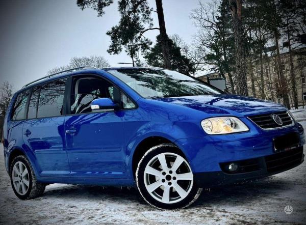 Zils Volkswagen Touran 2005 Alīta, ar dzinēja tilpumu 1.97 L un nobraukumu 291 tūkst. km par 3499 €, foto 8 vietnē AUTOMOTO.COM.LV