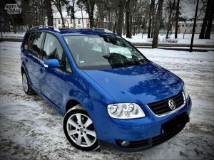 Zils Volkswagen Touran 2005 Alīta, ar dzinēja tilpumu 2.00 L un nobraukumu 291 tūkst. km par 3399 €, foto 3 vietnē AUTOMOTO.COM.LV