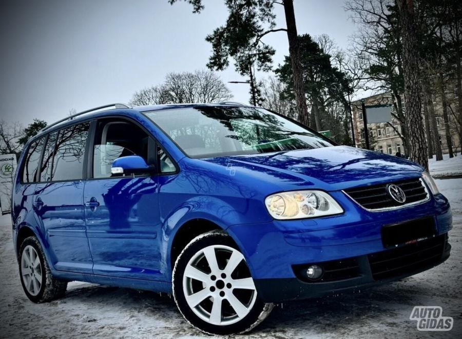 Zils Volkswagen Touran 2005 Alīta, ar dzinēja tilpumu 2.00 L un nobraukumu 291 tūkst. km par 3399 €, foto 7 vietnē AUTOMOTO.COM.LV