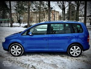 Zils Volkswagen Touran 2005 Alīta, ar dzinēja tilpumu 2.00 L un nobraukumu 291 tūkst. km par 3399 €, foto 11 vietnē AUTOMOTO.COM.LV