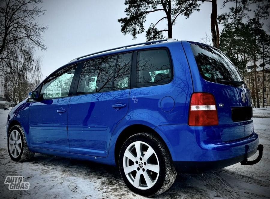 Zils Volkswagen Touran 2005 Alīta, ar dzinēja tilpumu 2.00 L un nobraukumu 291 tūkst. km par 3399 €, foto 14 vietnē AUTOMOTO.COM.LV
