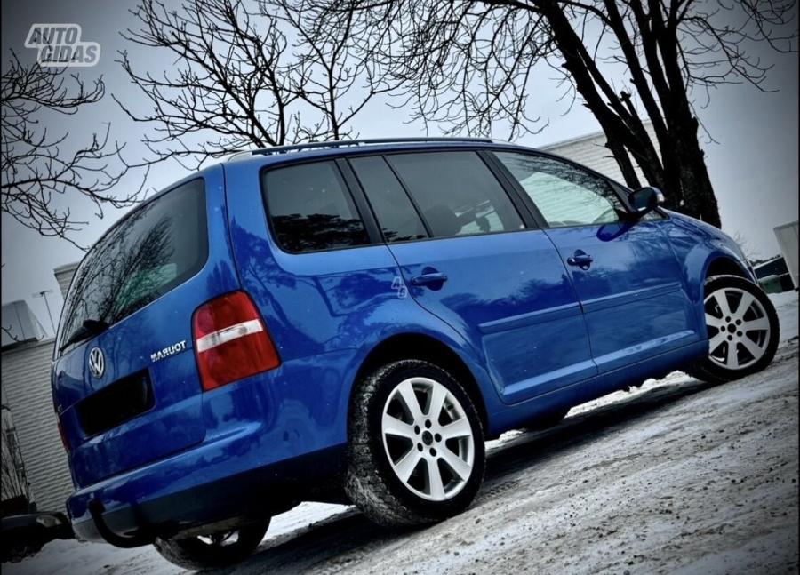 Zils Volkswagen Touran 2005 Alīta, ar dzinēja tilpumu 2.00 L un nobraukumu 291 tūkst. km par 3399 €, foto 18 vietnē AUTOMOTO.COM.LV