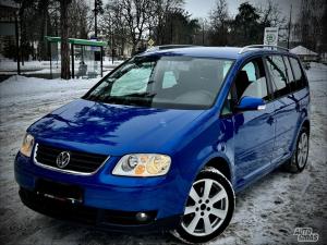 Zils Volkswagen Touran 2005 Alīta, ar dzinēja tilpumu 2.00 L un nobraukumu 291 tūkst. km par 3399 €, foto 21 vietnē AUTOMOTO.COM.LV
