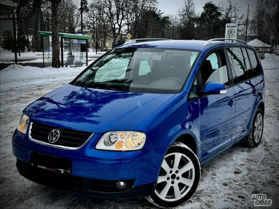 Zils Volkswagen Touran 2005 Alīta, ar dzinēja tilpumu 2.00 L un nobraukumu 291 tūkst. km par 3399 €, foto 21 vietnē AUTOMOTO.COM.LV