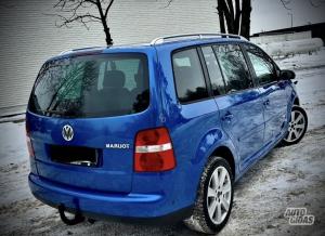 Zils Volkswagen Touran 2005 Alīta, ar dzinēja tilpumu 2.00 L un nobraukumu 291 tūkst. km par 3399 €, foto 24 vietnē AUTOMOTO.COM.LV