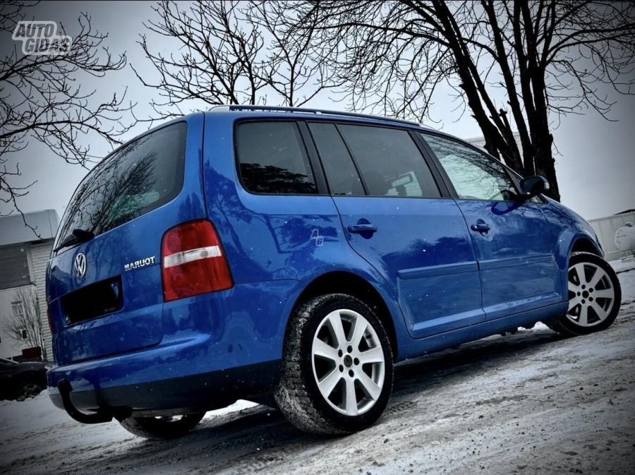 Zils Volkswagen Touran 2005 Alīta, ar dzinēja tilpumu 2.00 L un nobraukumu 291 tūkst. km par 3399 €, foto 26 vietnē AUTOMOTO.COM.LV