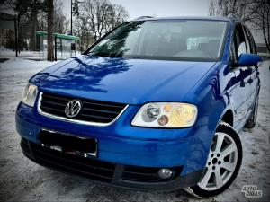 Zils Volkswagen Touran 2005 Alīta, ar dzinēja tilpumu 2.00 L un nobraukumu 291 tūkst. km par 3399 €, foto 27 vietnē AUTOMOTO.COM.LV