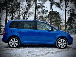 Zils Volkswagen Touran 2005 Alīta, ar dzinēja tilpumu 2.00 L un nobraukumu 291 tūkst. km par 3399 €, foto 29 vietnē AUTOMOTO.COM.LV
