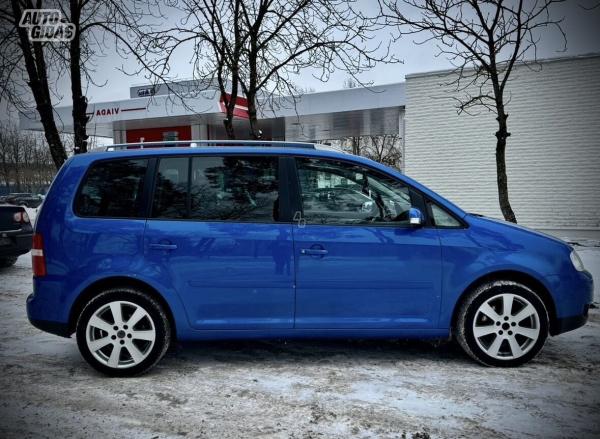 Zils Volkswagen Touran 2005 Alīta, ar dzinēja tilpumu 2.00 L un nobraukumu 291 tūkst. km par 3299 €, foto 2 vietnē AUTOMOTO.COM.LV