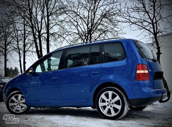 Zils Volkswagen Touran 2005 Alīta, ar dzinēja tilpumu 2.00 L un nobraukumu 291 tūkst. km par 3299 €, foto 5 vietnē AUTOMOTO.COM.LV