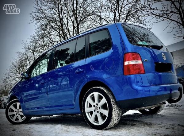 Zils Volkswagen Touran 2005 Alīta, ar dzinēja tilpumu 2.00 L un nobraukumu 291 tūkst. km par 3299 €, foto 7 vietnē AUTOMOTO.COM.LV