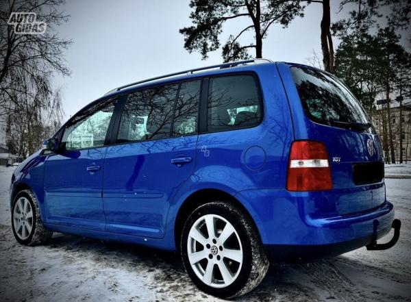Zils Volkswagen Touran 2005 Alīta, ar dzinēja tilpumu 2.00 L un nobraukumu 291 tūkst. km par 3299 €, foto 9 vietnē AUTOMOTO.COM.LV