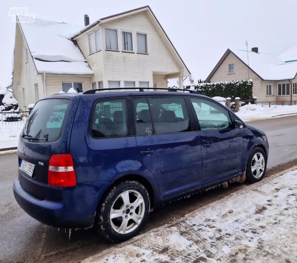 Blue Volkswagen Touran 2005 in Vilnius, with an engine capacity of 1.90 L and mileage of 33 thousand km for 1550 €, photo 4 on AUTOMOTO.COM.LV