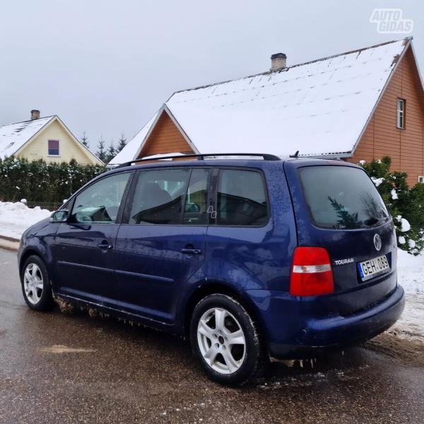 Blue Volkswagen Touran 2005 in Vilnius, with an engine capacity of 1.90 L and mileage of 33 thousand km for 1550 €, photo 5 on AUTOMOTO.COM.LV