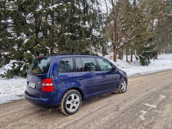Blue Volkswagen Touran 2005 in Vilnius, with an engine capacity of 1.90 L and mileage of 33 thousand km for 1550 €, photo 6 on AUTOMOTO.COM.LV
