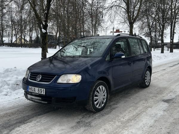 Blue Volkswagen Touran 2005 in Siauliai, with an engine capacity of 1.90 L and mileage of 400 thousand km for 850 €, photo 2 on AUTOMOTO.COM.LV