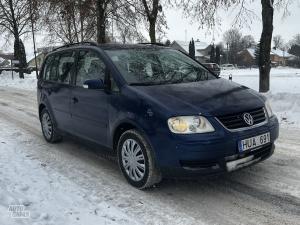 Blue Volkswagen Touran 2005 in Siauliai, with an engine capacity of 1.90 L and mileage of 400 thousand km for 850 €, photo 4 on AUTOMOTO.COM.LV