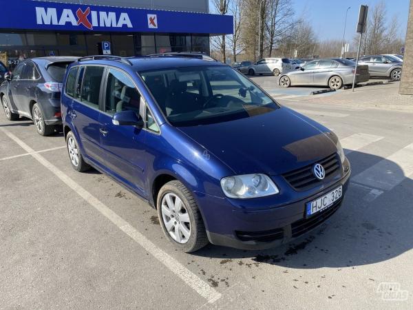 Blue Volkswagen Touran 2005 in Vilnius, with an engine capacity of 1.90 L and mileage of 330 thousand km for 1500 €, photo 1 on AUTOMOTO.COM.LV