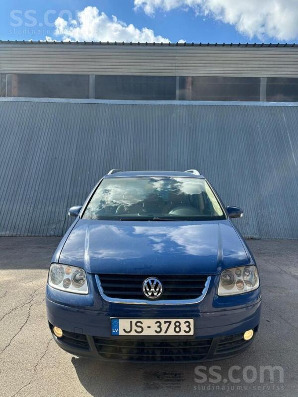 Zils Volkswagen Touran 2005 Jelgava, ar dzinēja tilpumu 2.00 L un nobraukumu 330 tūkst. km par 2900 €, foto 2 vietnē AUTOMOTO.COM.LV