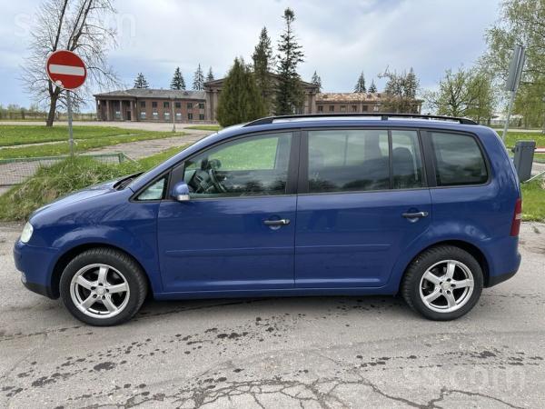 Zils Volkswagen Touran 2005 Rīga, ar dzinēja tilpumu 1.90 L un nobraukumu 166 tūkst. km par 2900 €, foto 1 vietnē AUTOMOTO.COM.LV