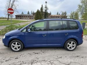 Blue Volkswagen Touran 2005 in Riga, with an engine capacity of 1.90 L and mileage of 166 thousand km for 2900 €, photo  on AUTOMOTO.COM.LV
