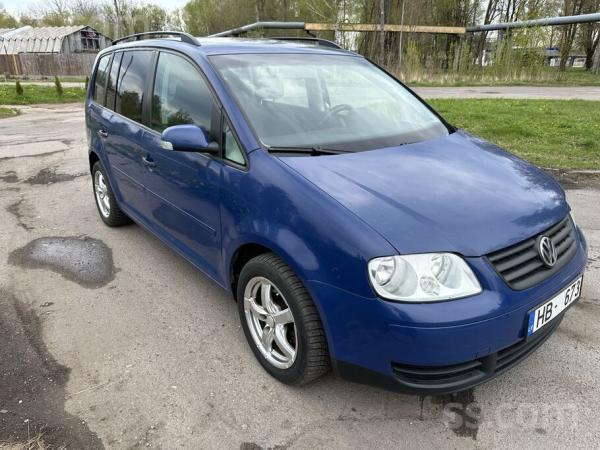 Zils Volkswagen Touran 2005 Rīga, ar dzinēja tilpumu 1.90 L un nobraukumu 166 tūkst. km par 2900 €, foto 3 vietnē AUTOMOTO.COM.LV