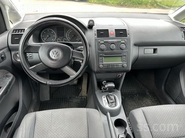 Zils Volkswagen Touran 2005 Rīga, ar dzinēja tilpumu 1.90 L un nobraukumu 166 tūkst. km par 2900 €, foto 5 vietnē AUTOMOTO.COM.LV