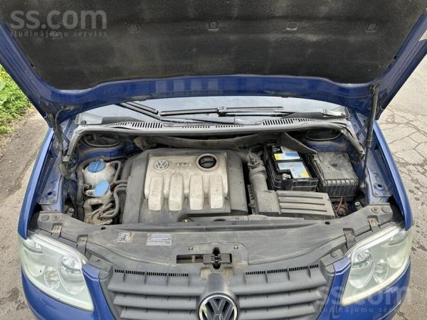 Zils Volkswagen Touran 2005 Rīga, ar dzinēja tilpumu 1.90 L un nobraukumu 166 tūkst. km par 2900 €, foto 6 vietnē AUTOMOTO.COM.LV