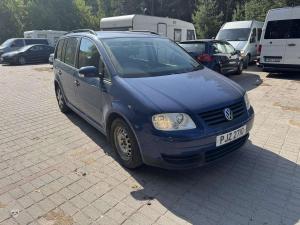 Zils Volkswagen Touran 2005 Viļņa, ar dzinēja tilpumu 1.90 L un nobraukumu 250 tūkst. km par 650 €, foto  vietnē AUTOMOTO.COM.LV