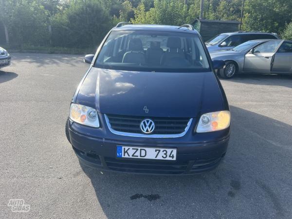 Blue Volkswagen Touran 2005 in Siauliai, with an engine capacity of 2.00 L and mileage of 0 thousand km for 849 €, photo 2 on AUTOMOTO.COM.LV