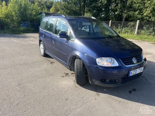 Blue Volkswagen Touran 2005 in Siauliai, with an engine capacity of 2.00 L and mileage of 0 thousand km for 849 €, photo 3 on AUTOMOTO.COM.LV