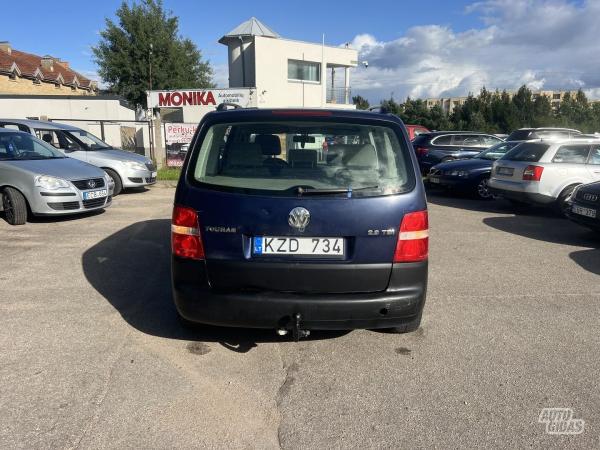 Blue Volkswagen Touran 2005 in Siauliai, with an engine capacity of 2.00 L and mileage of 0 thousand km for 849 €, photo 5 on AUTOMOTO.COM.LV
