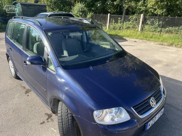Blue Volkswagen Touran 2005 in Siauliai, with an engine capacity of 2.00 L and mileage of 0 thousand km for 849 €, photo 10 on AUTOMOTO.COM.LV