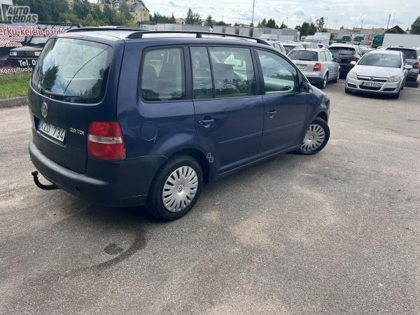 Zils Volkswagen Touran 2005 Šauļi, ar dzinēja tilpumu 2.00 L un nobraukumu 0 tūkst. km par 749 €, foto 5 vietnē AUTOMOTO.COM.LV