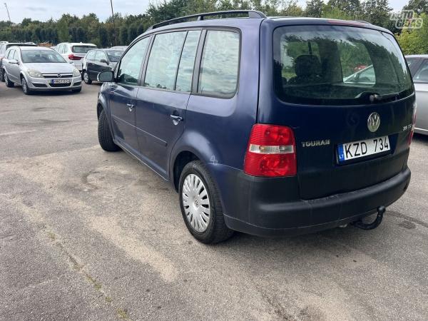 Zils Volkswagen Touran 2005 Šauļi, ar dzinēja tilpumu 2.00 L un nobraukumu 0 tūkst. km par 749 €, foto 7 vietnē AUTOMOTO.COM.LV