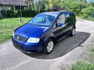 Blue Volkswagen Touran 2005 in Daugavpils, with an engine capacity of 1.90 L and mileage of 297 thousand km for 2649 €, photo 1 on AUTOMOTO.COM.LV