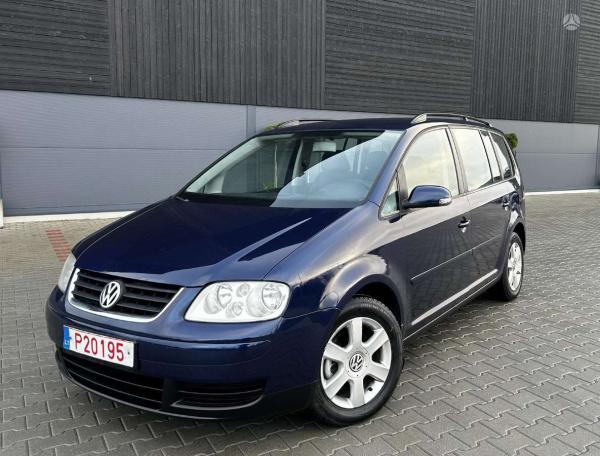 Zils Volkswagen Touran 2006 Šauļi, ar dzinēja tilpumu 1.60 L un nobraukumu 253 tūkst. km par 1990 €, foto 1 vietnē AUTOMOTO.COM.LV