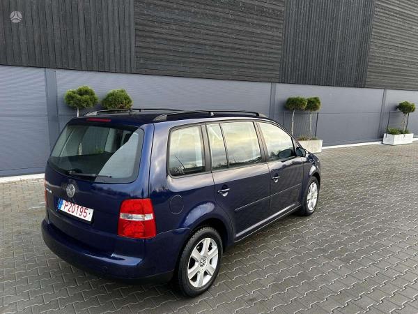 Zils Volkswagen Touran 2006 Šauļi, ar dzinēja tilpumu 1.60 L un nobraukumu 253 tūkst. km par 1990 €, foto 8 vietnē AUTOMOTO.COM.LV