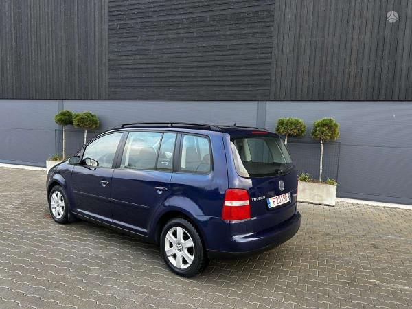 Zils Volkswagen Touran 2006 Šauļi, ar dzinēja tilpumu 1.60 L un nobraukumu 253 tūkst. km par 1990 €, foto 9 vietnē AUTOMOTO.COM.LV