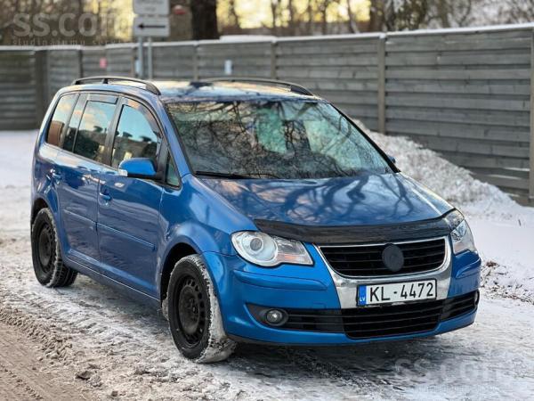 Blue Volkswagen Touran 2006 in Jelgava, with an engine capacity of 2.00 L and mileage of 381 thousand km for 1850 €, photo 1 on AUTOMOTO.COM.LV