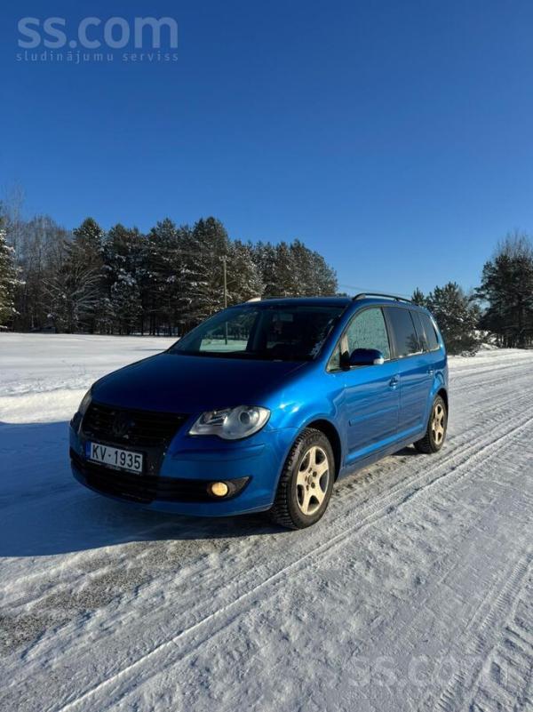 Zils Volkswagen Touran 2006 Rīga, ar dzinēja tilpumu 1.90 L un nobraukumu 300 tūkst. km par 2200 €, foto 1 vietnē AUTOMOTO.COM.LV