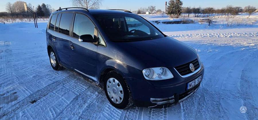 Blue Volkswagen Touran 2006 in Pasvalys, with an engine capacity of 1.89 L and mileage of 283 thousand km for 980 €, photo 1 on AUTOMOTO.COM.LV