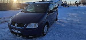 Blue Volkswagen Touran 2006 in Pasvalys, with an engine capacity of 1.89 L and mileage of 283 thousand km for 980 €, photo 3 on AUTOMOTO.COM.LV