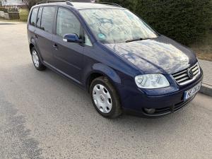 Zils Volkswagen Touran 2006 Lazdijai, ar dzinēja tilpumu 1.90 L un nobraukumu 301 tūkst. km par 2350 €, foto  vietnē AUTOMOTO.COM.LV