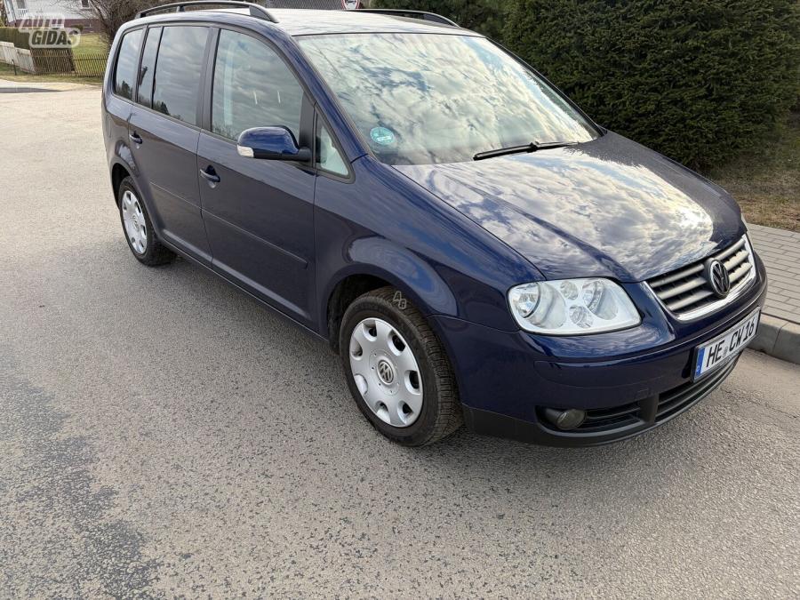 Zils Volkswagen Touran 2006 Lazdijai, ar dzinēja tilpumu 1.90 L un nobraukumu 301 tūkst. km par 2350 €, foto 1 vietnē AUTOMOTO.COM.LV